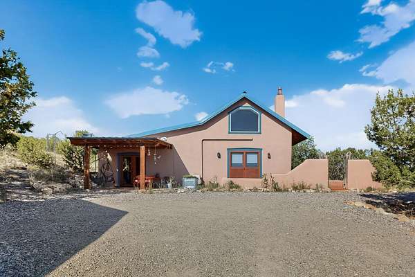 5.66 Acres of Residential Land with Home for Sale in Lamy, New Mexico - LandSearch