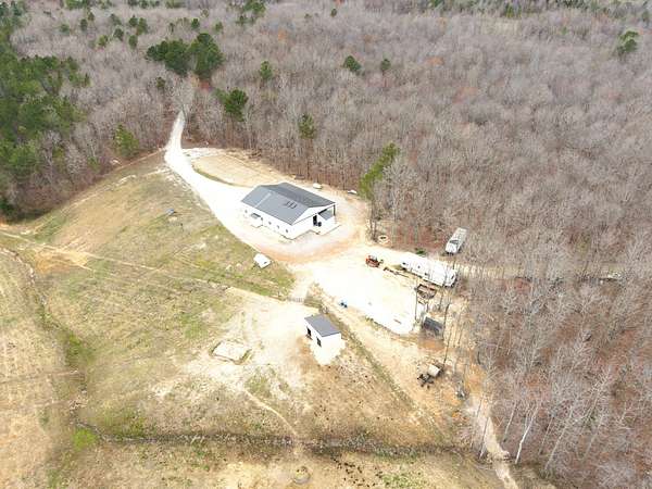 47.8 Acres of Land with Home for Sale in Big Sandy, Tennessee - LandSearch